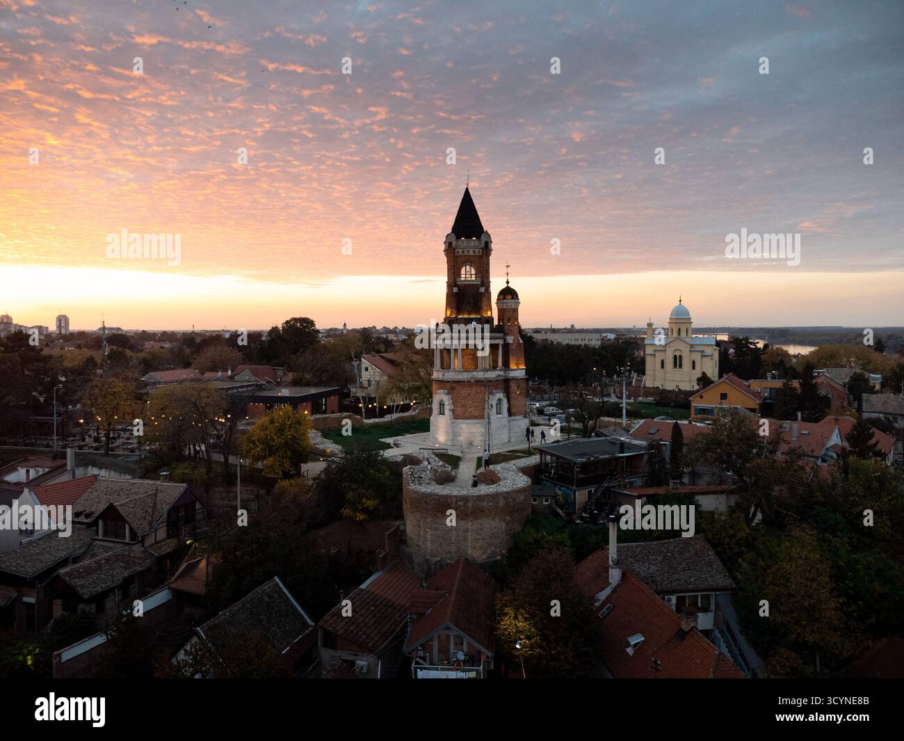Aerial view of Zemun town and Gardosh tower at sunset, rooftops and ...