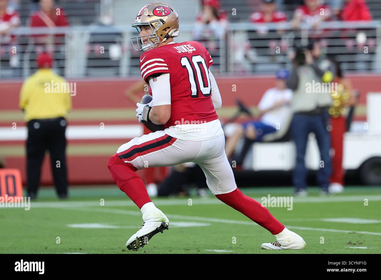 San Francisco 49ers quarterback Mac Jones (10) works in the pocket ...