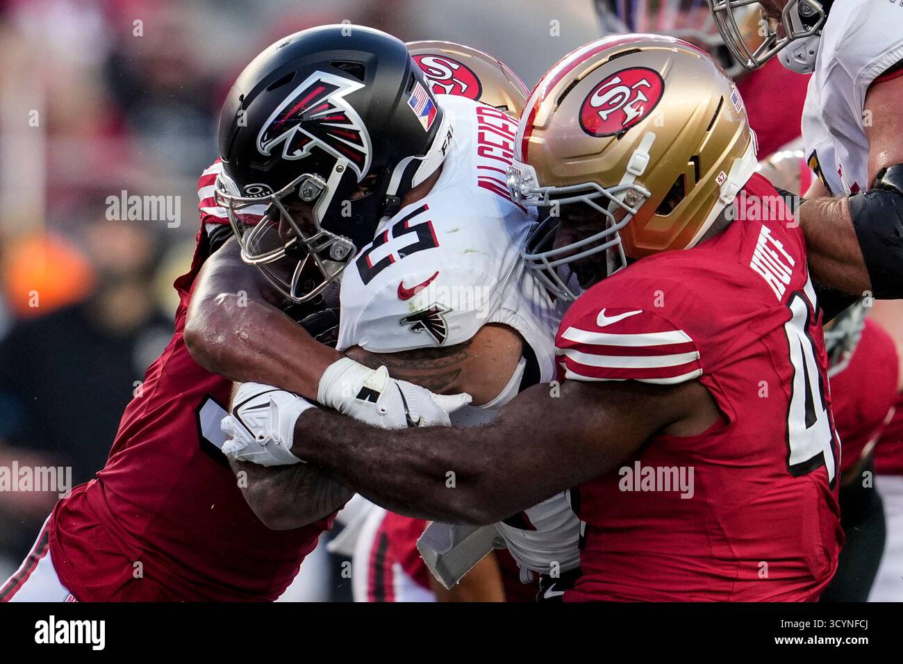 Atlanta Falcons running back Tyler Allgeier (25) is hit by San ...