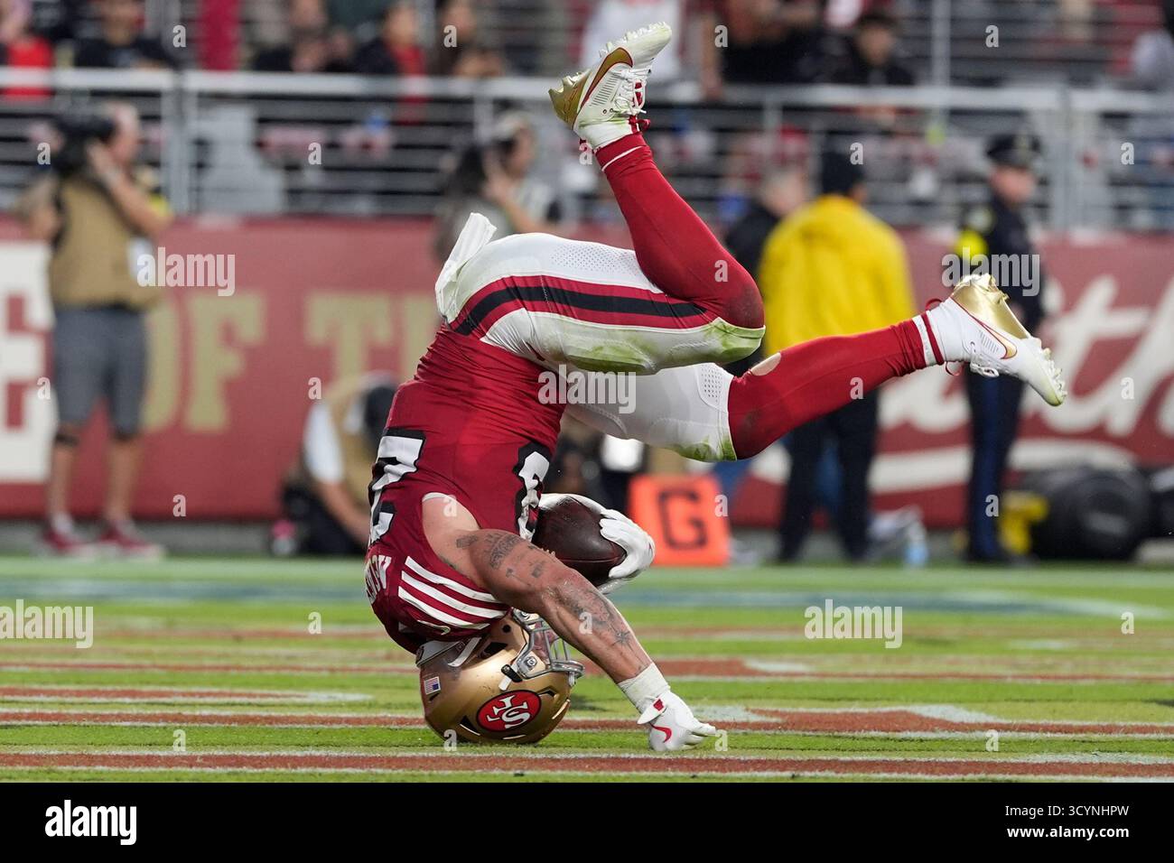 San Francisco 49ers running back Christian McCaffrey (23) scores a ...