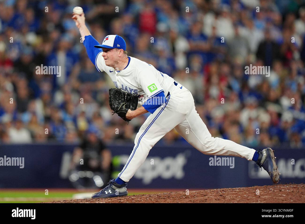 Toronto Blue Jays pitcher Louis Varland (77) works against the Seattle ...