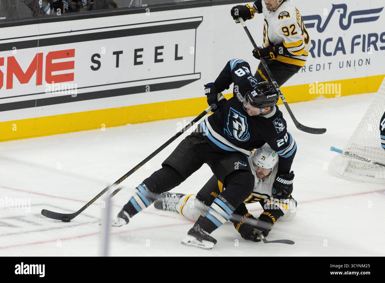 Utah Mammoth defense Ian Cole (28) fights for the puck against Boston ...