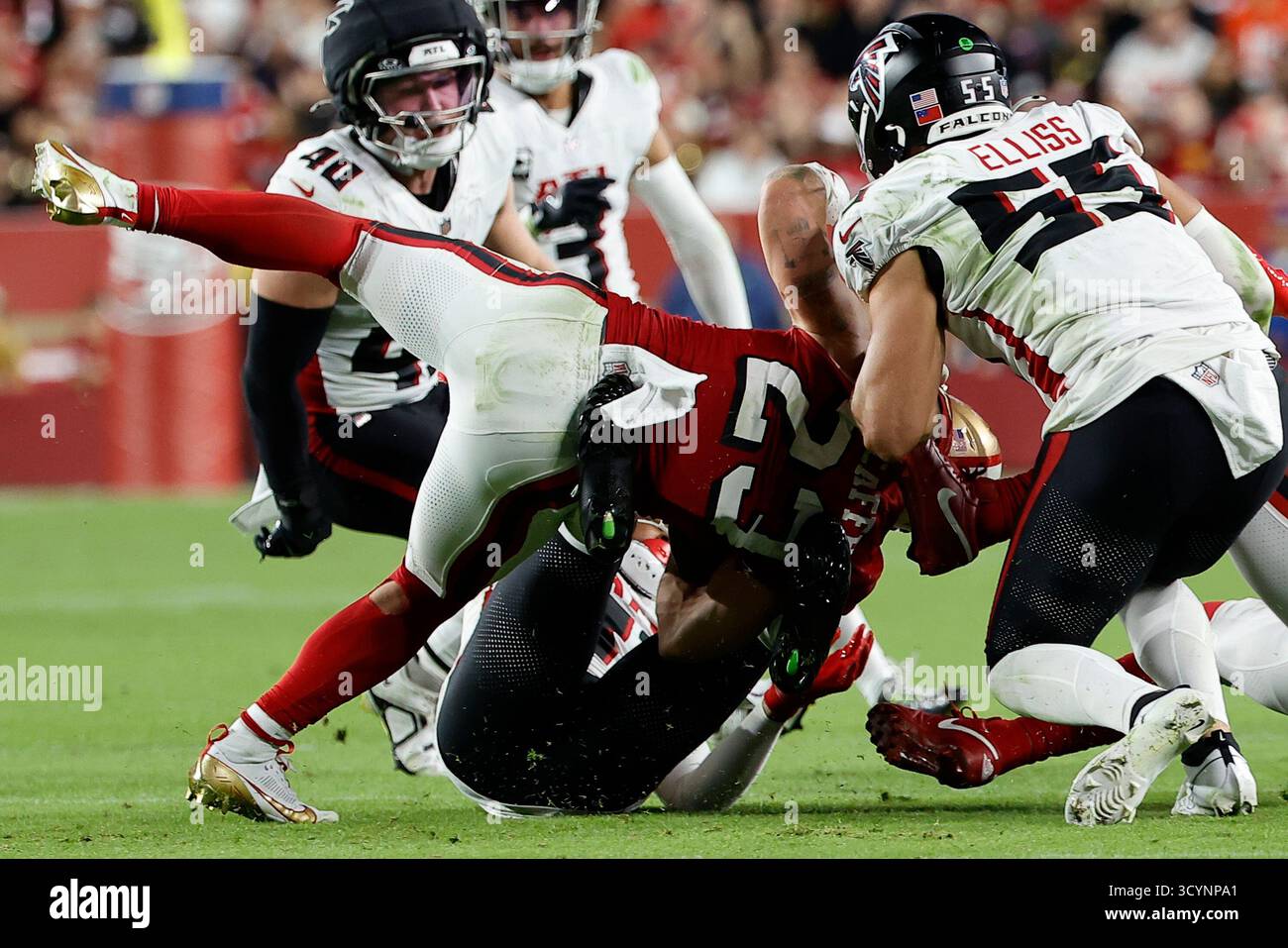 San Francisco 49ers running back Christian McCaffrey (23) is hit by ...