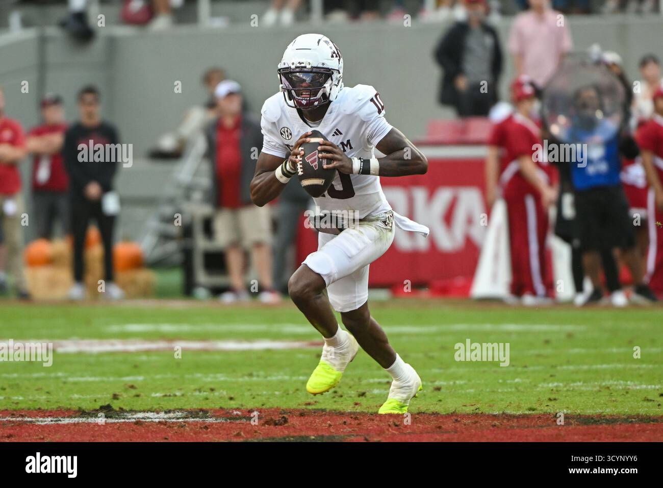 Texas A&M quarterback Marcel Reed (10) scrambles out of the pocket ...