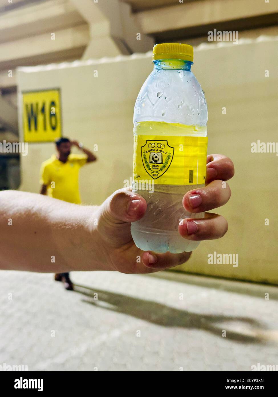 Free bottled water at Al Wasl FC Home football match Stock Photo - Alamy