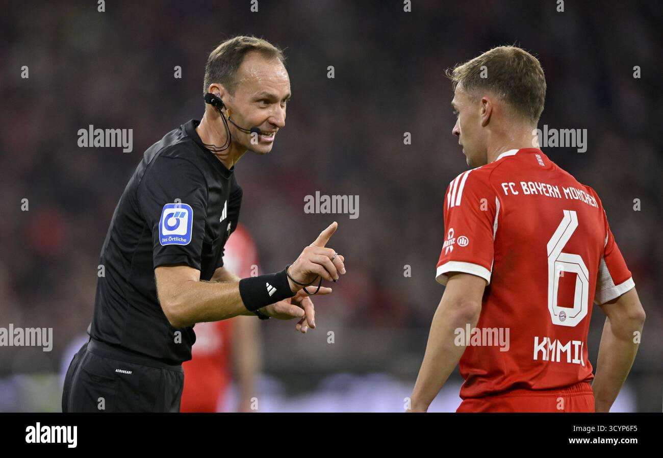 Referee Bastian Dankert talking with Joshua Kimmich FC Bayern Munich ...