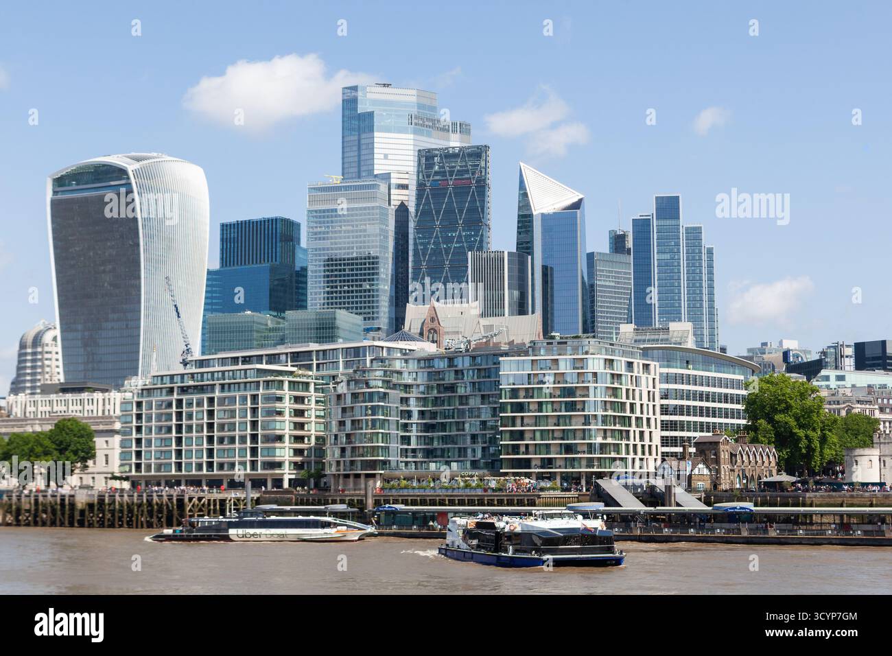Modern skyscrapers in London's financial district by the River Thames ...