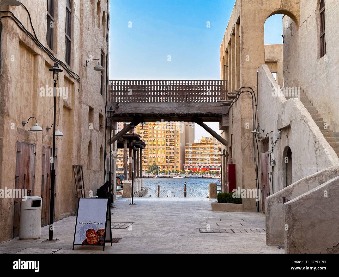 Scenic old town alley with stone buildings, traditional Middle Eastern ...