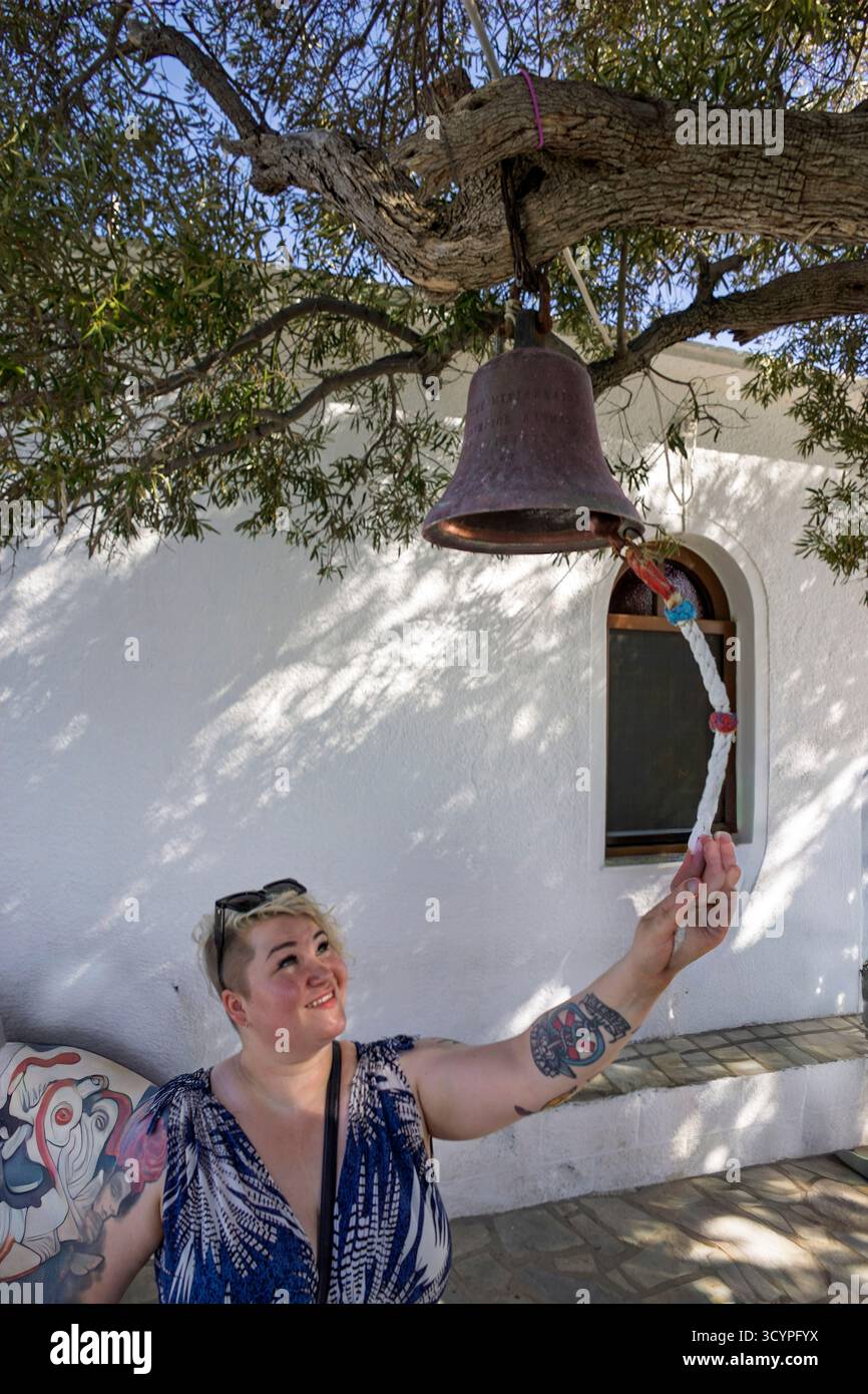 Woman ringing bell give hi-res stock photography and images - Alamy