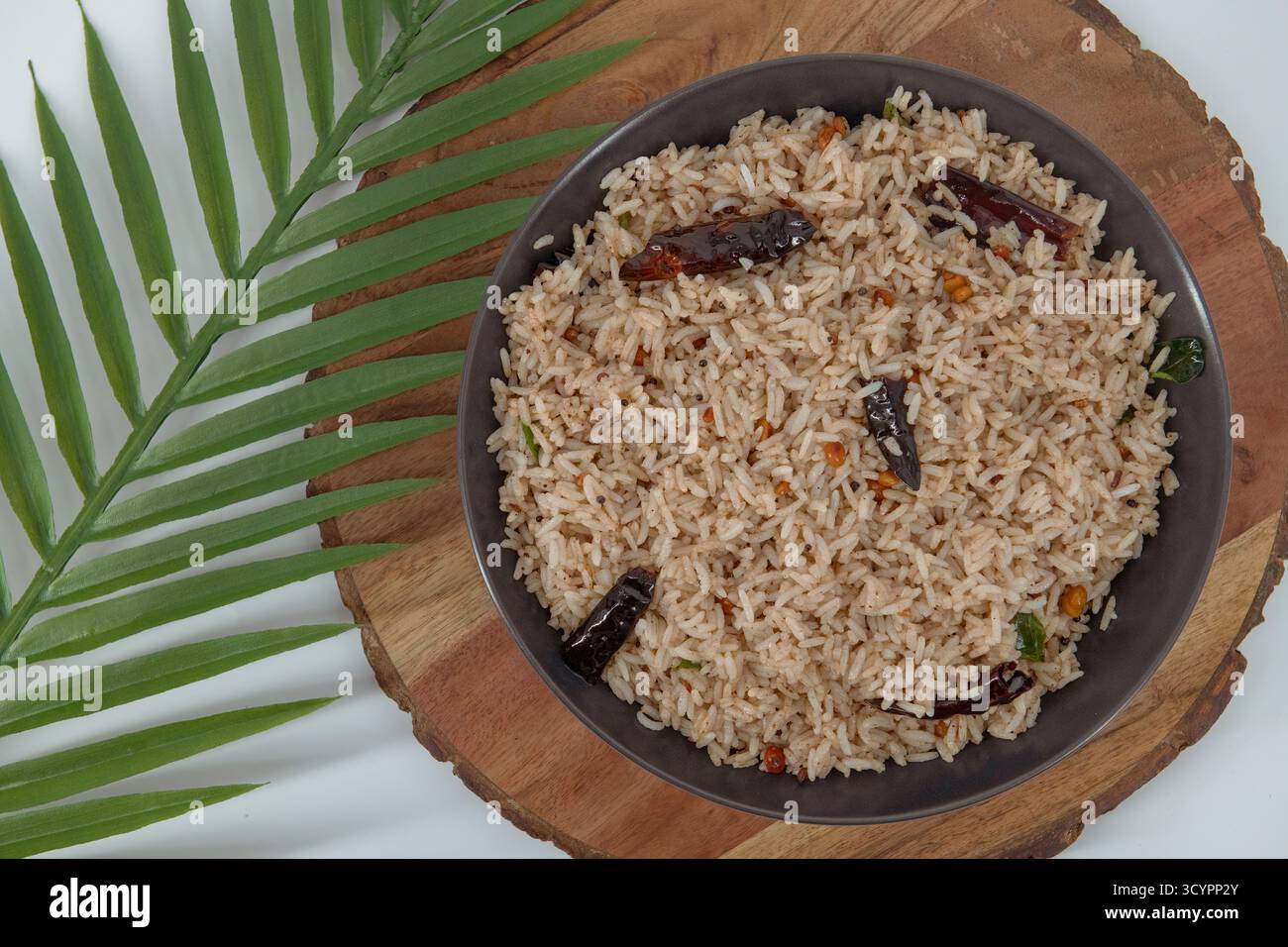 Tamarind Rice/ Puliyodharai / Puliyogare - Tangy and spicy South Indian ...