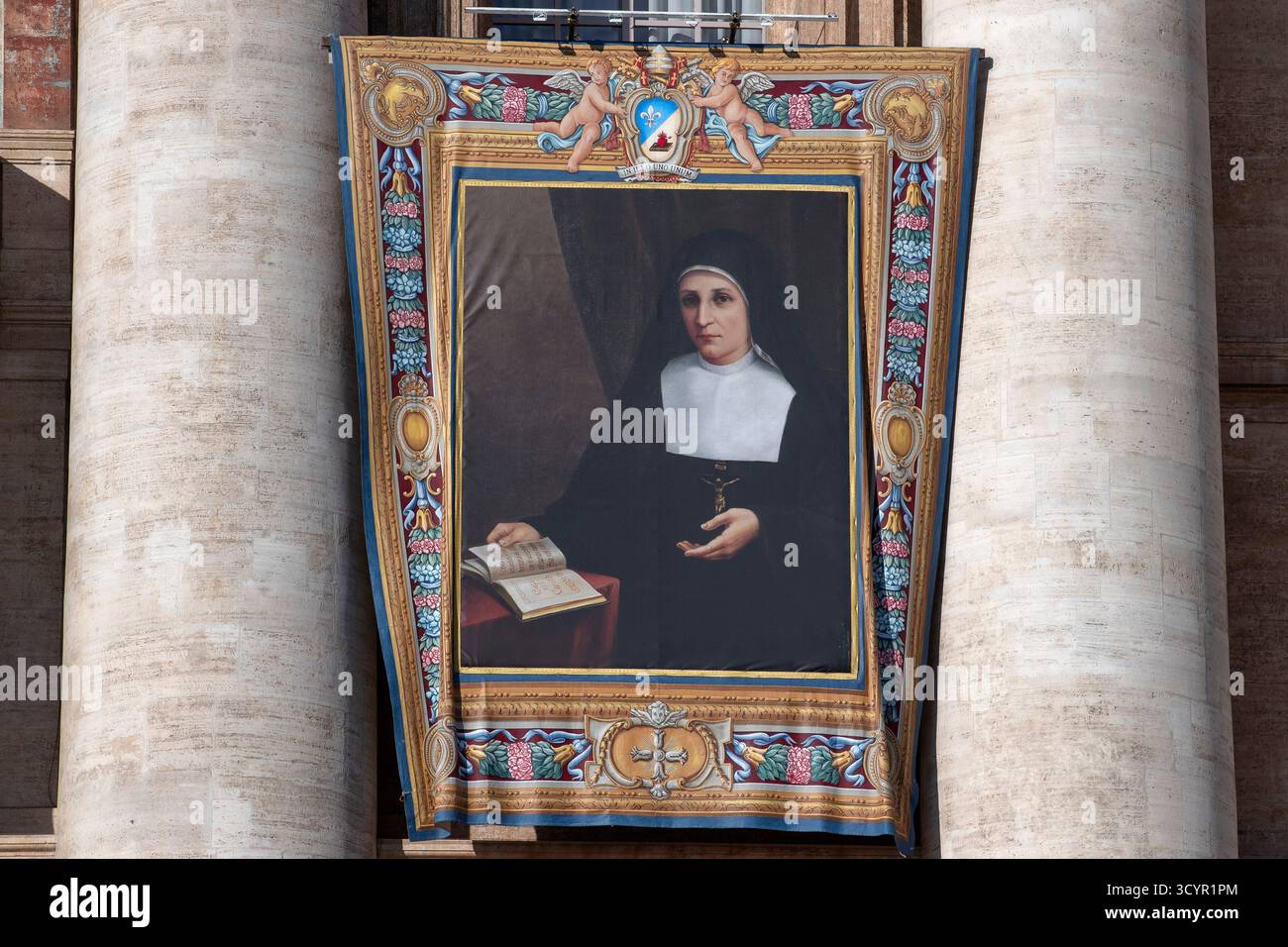 Tapestry featuring the new Saint Vincenza Maria Poloni hangs from a ...
