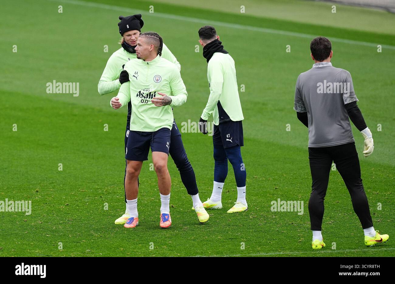 Manchester City's Erling Haaland (left) and Kalvin Phillips during a ...