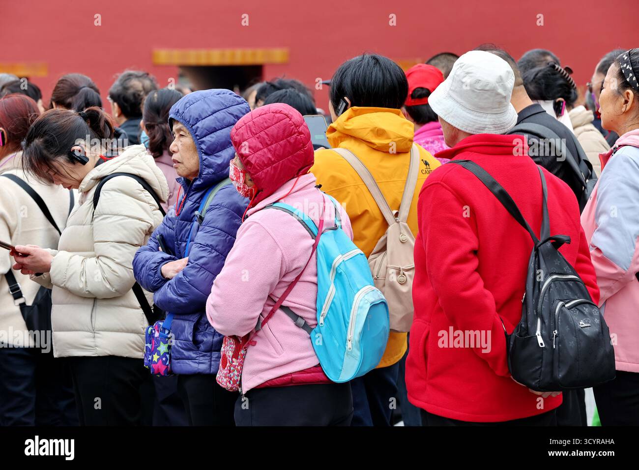 Tourists visit the Palace Museum amid cold air in Beijing, China, 17 ...