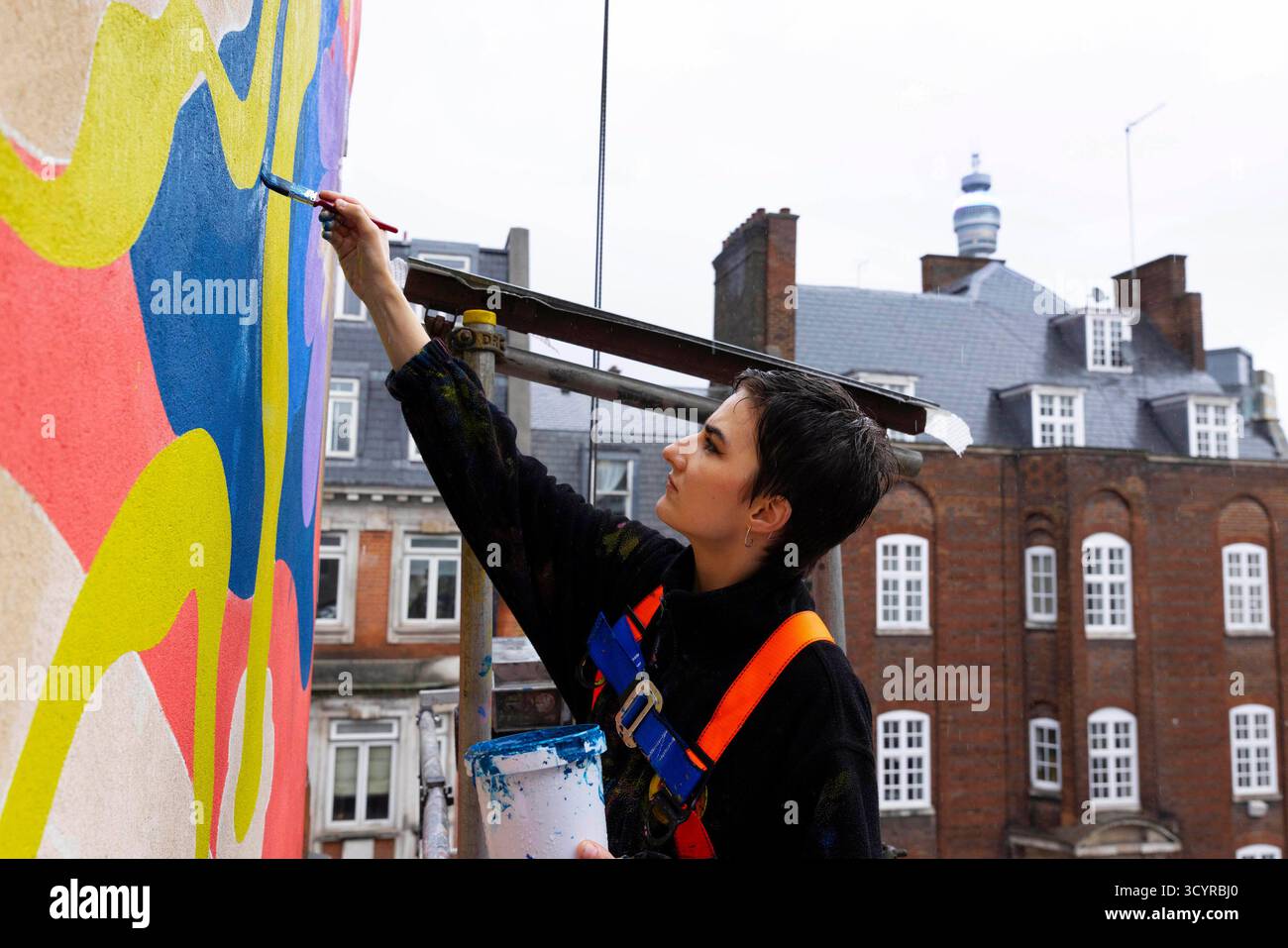 EDITORIAL USE ONLY Artist Oliwia Bober puts the finishing touches on ...