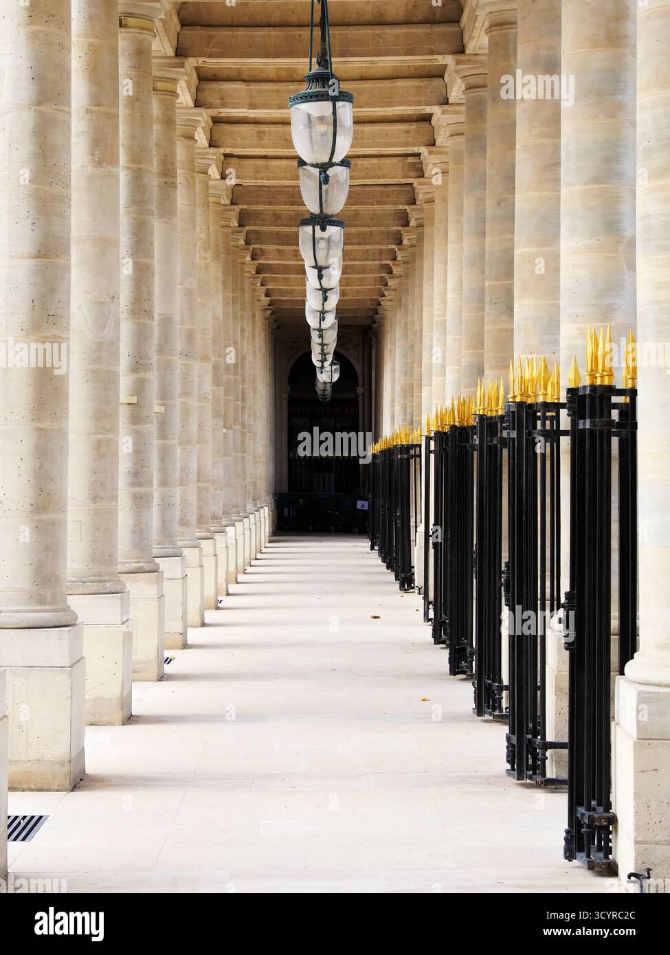 Colonnade between the courtyard and garden at the Palais Royal in Paris ...