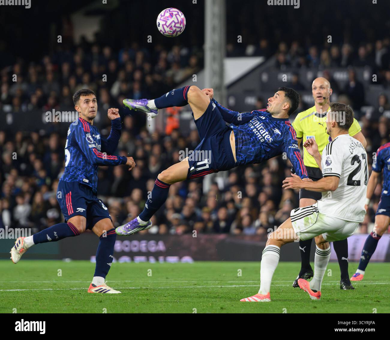 Attempts an overhead kick hi-res stock photography and images - Alamy