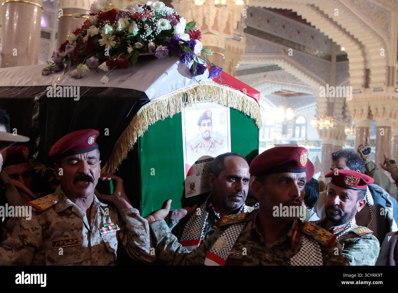 Houthi supporters carry the coffin of Maj. Gen. Muhammad Abdul Karim al ...