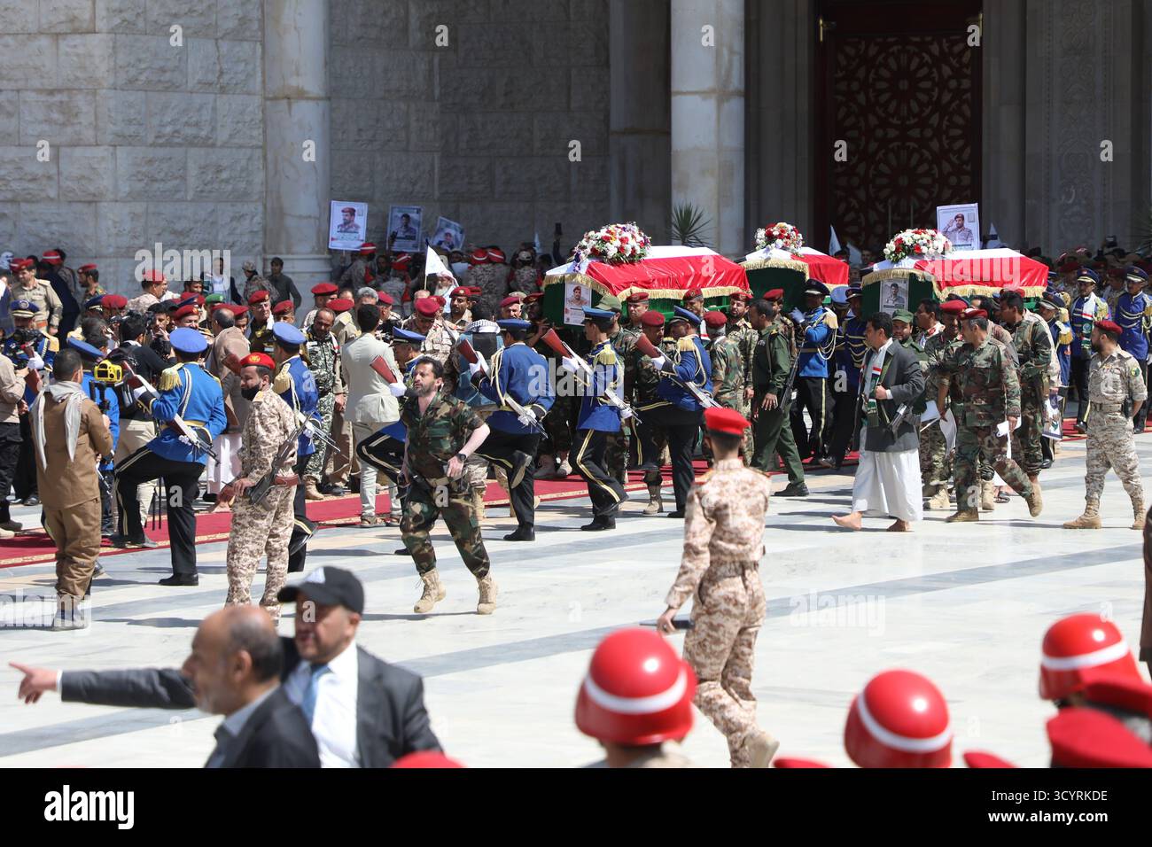 Houthi supporters carry the coffin of Maj. Gen. Muhammad Abdul Karim al ...