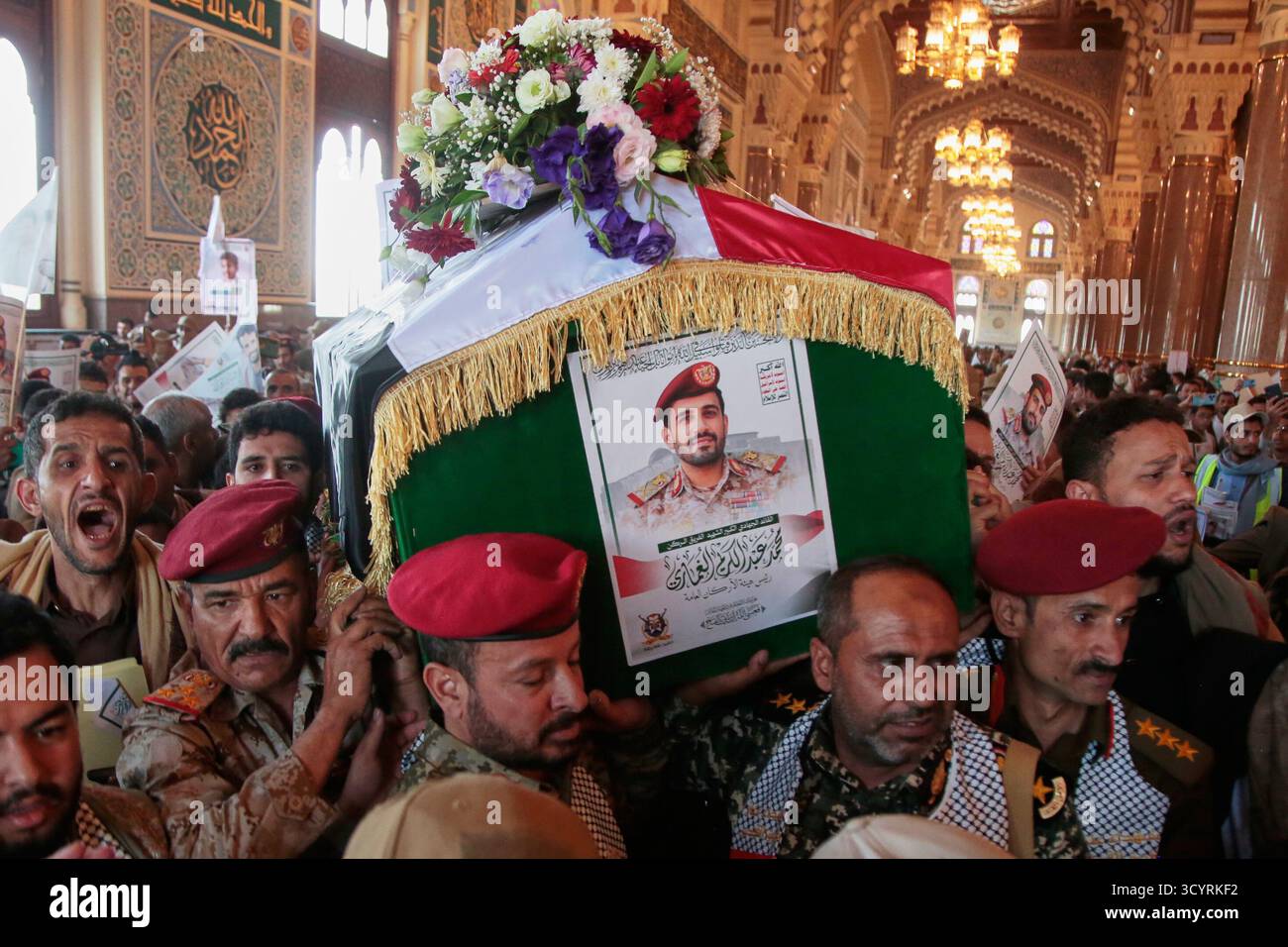 Houthi supporters carry the coffin of Maj. Gen. Muhammad Abdul Karim al ...