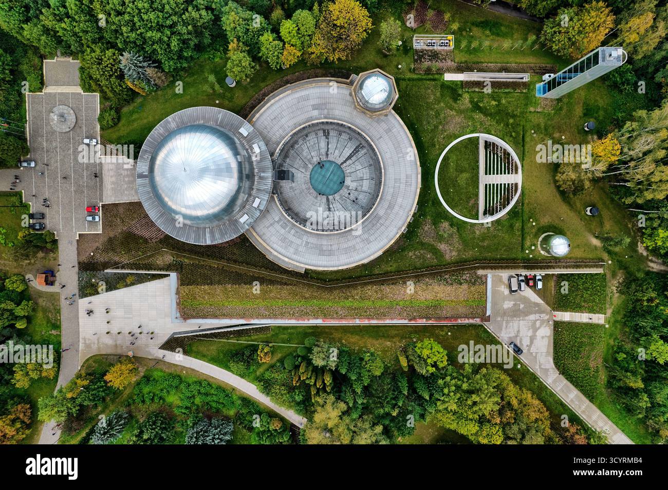 Aerial panorama of planetarium observatory and stadium in forest ...