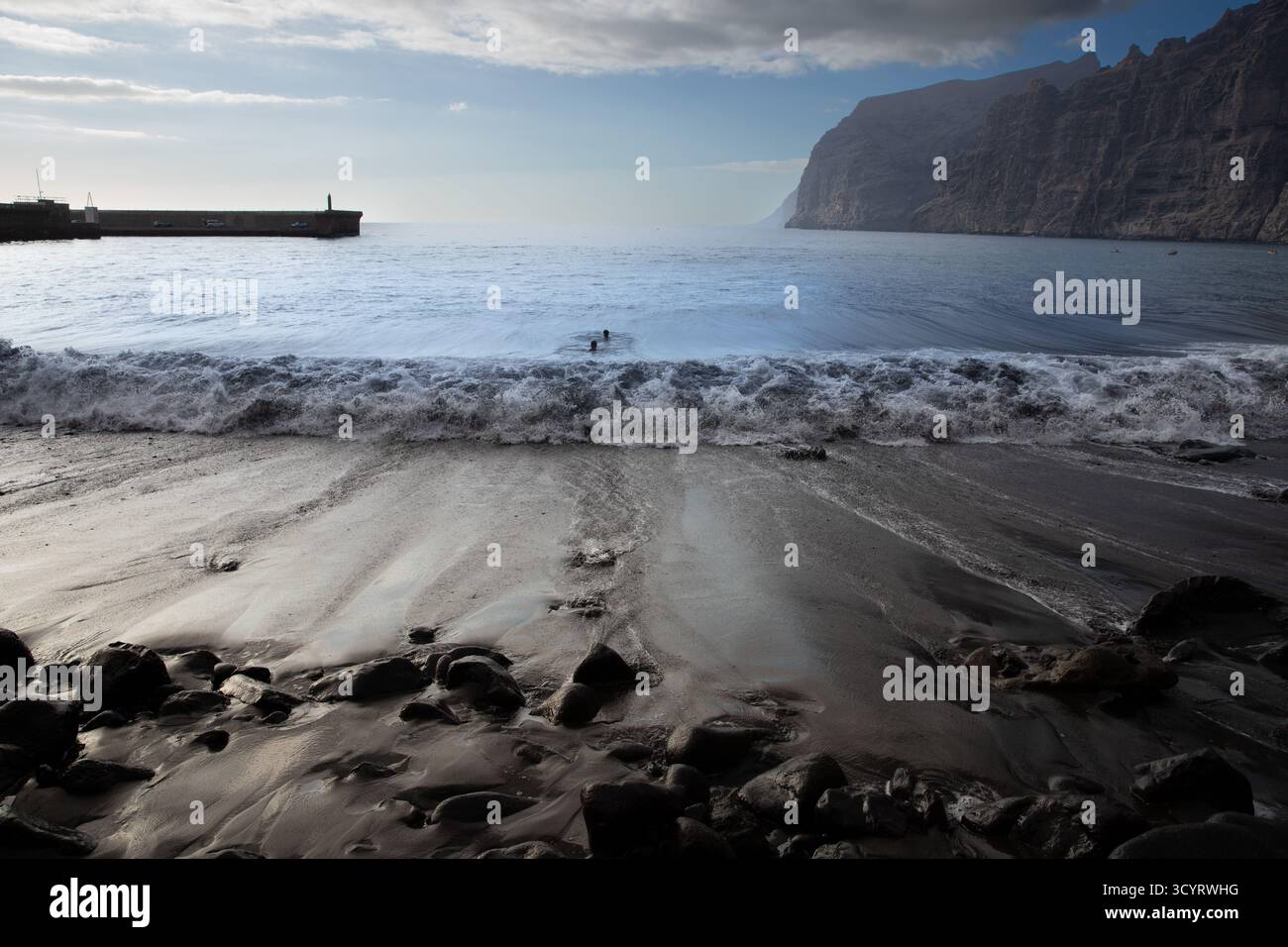 Scenic view of the Los Gigantes cliffs with ocean waves crashing on the ...