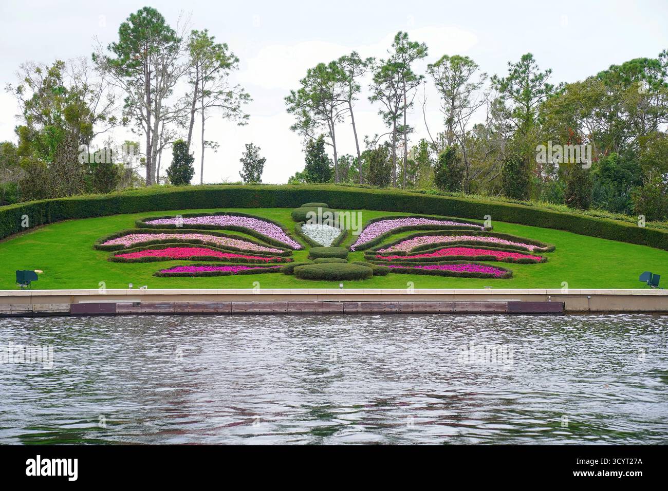 Vibrant flower garden shaped like butterfly wings blooms along the ...