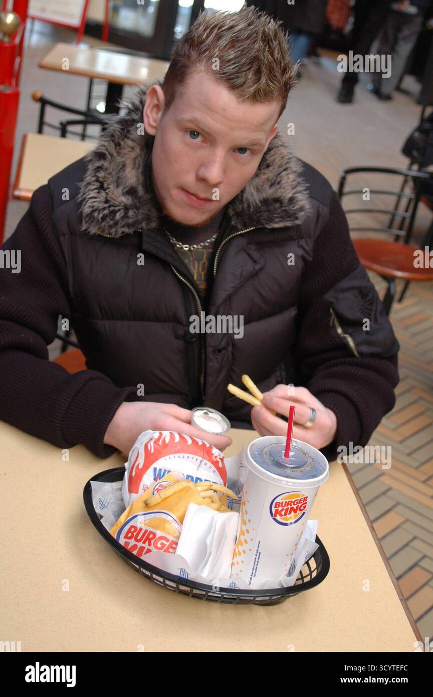 Man eat burger King in mamlø Sweden March 7,2006 Stock Photo - Alamy