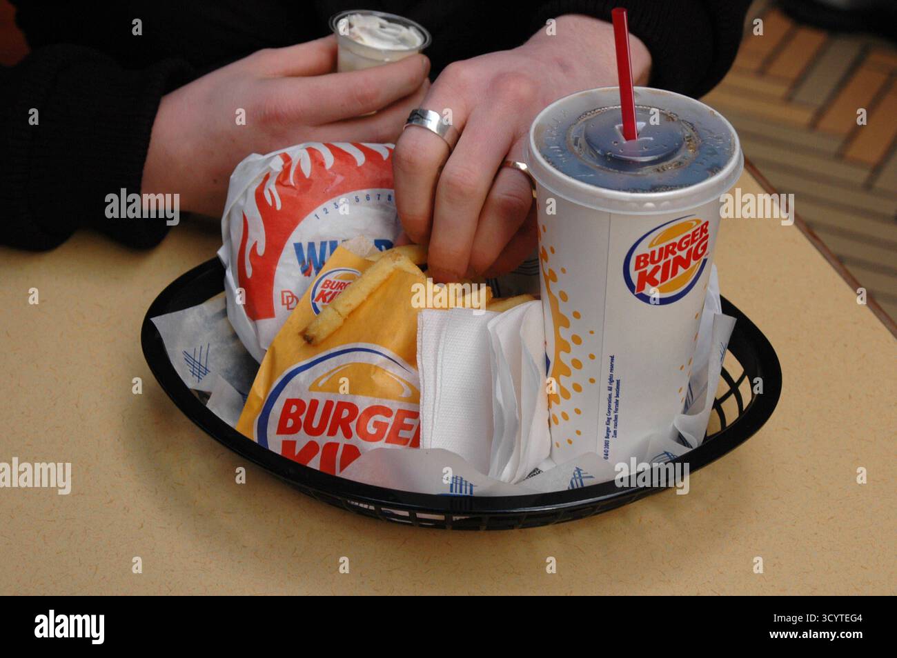 Man eat burger King in mamlø Sweden March 7,2006 Stock Photo - Alamy