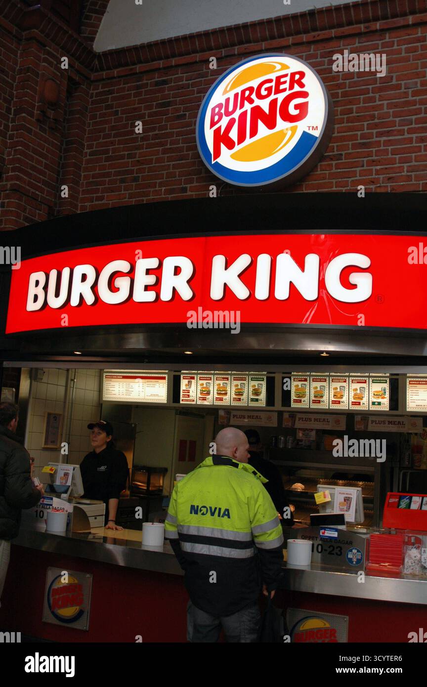 Man eat burger King in mamlø Sweden March 7,2006 Stock Photo - Alamy