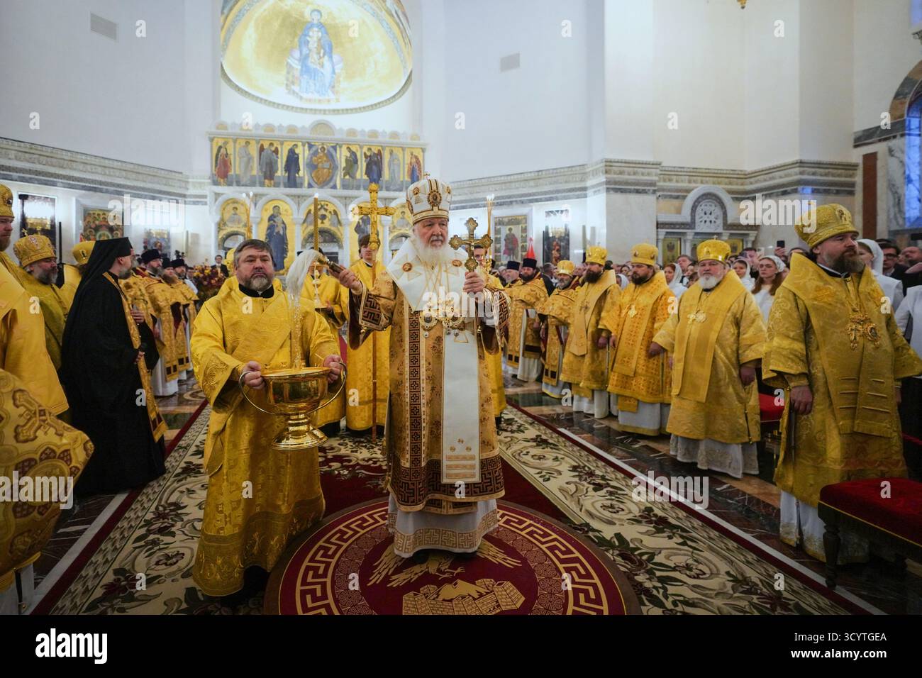 Russian Orthodox Patriarch Kirill, center, performs the rite of the ...