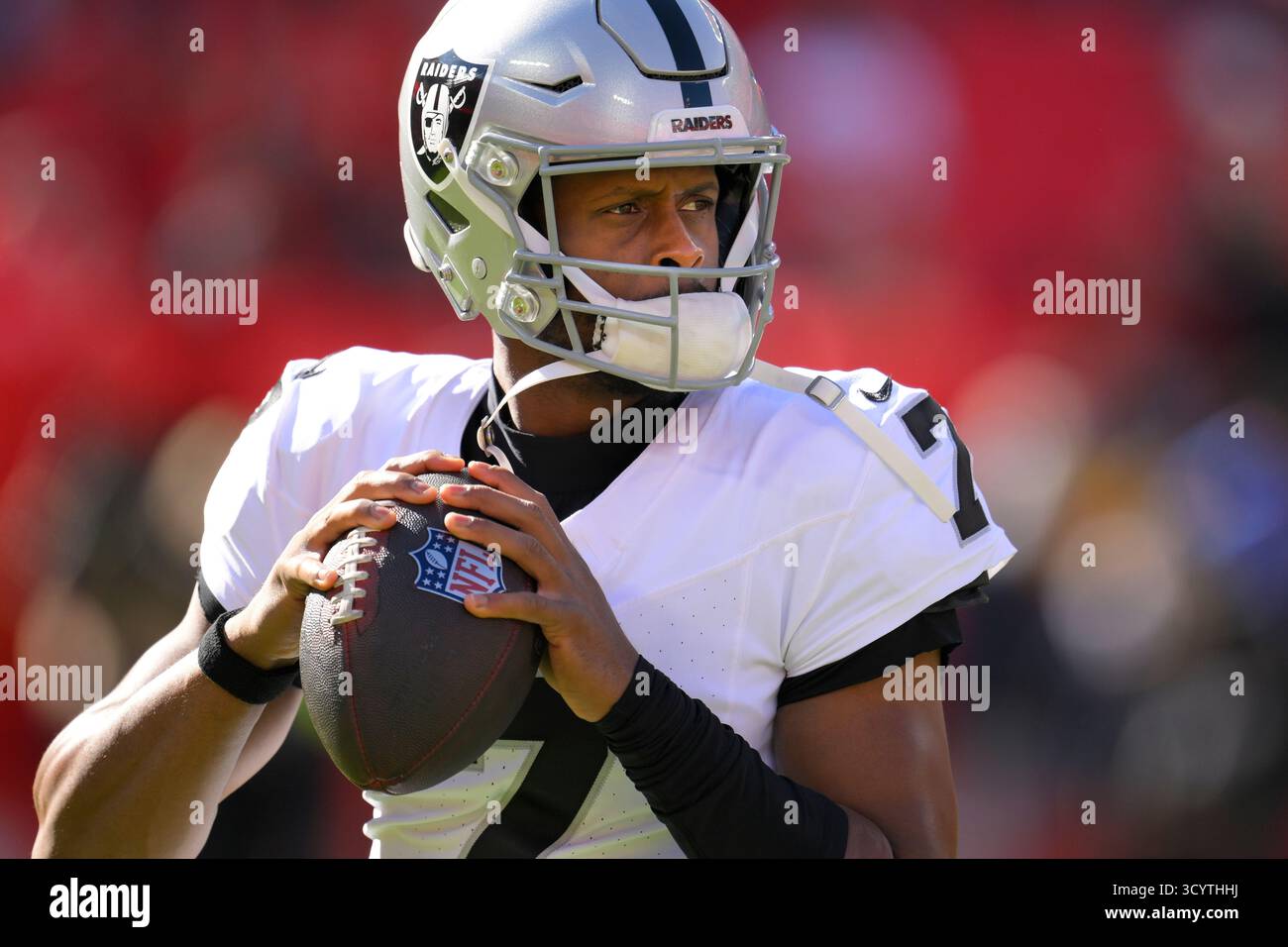 Las Vegas Raiders quarterback Geno Smith throws during warmups before ...