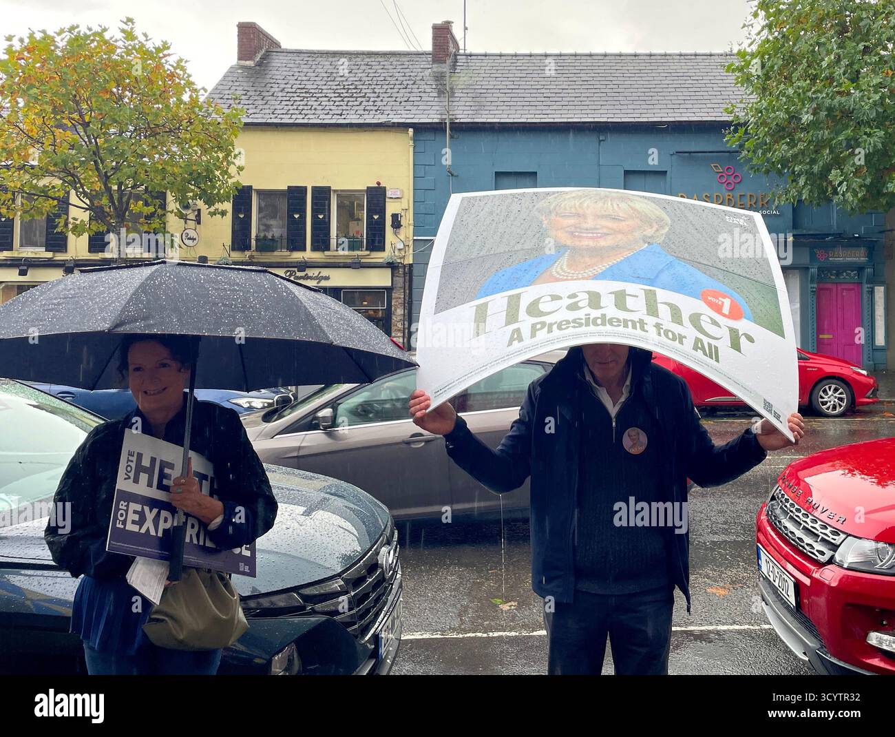 Supporters of Irish presidential candidate Heather Humphreys shelter ...
