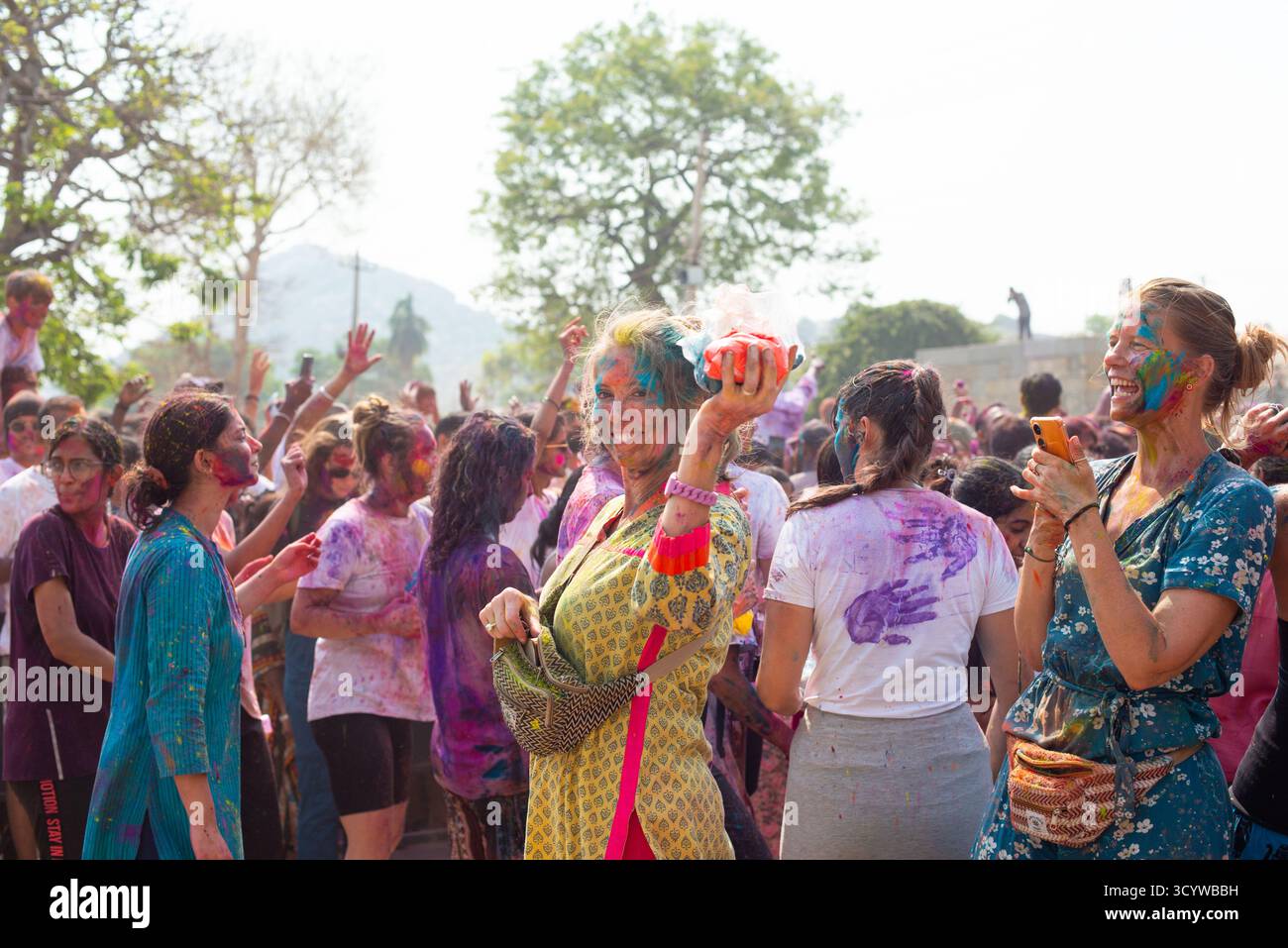 Holi festival in Hampi, people celebrating hindu holiday of colours ...