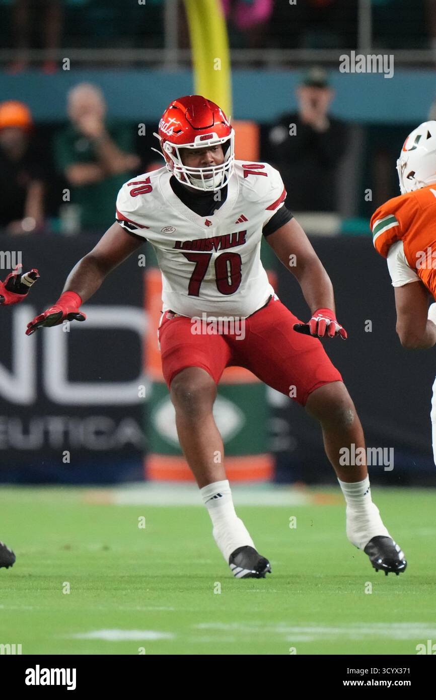 MIAMI GARDENS, FL - OCTOBER 17: Louisville Cardinals offensive lineman ...