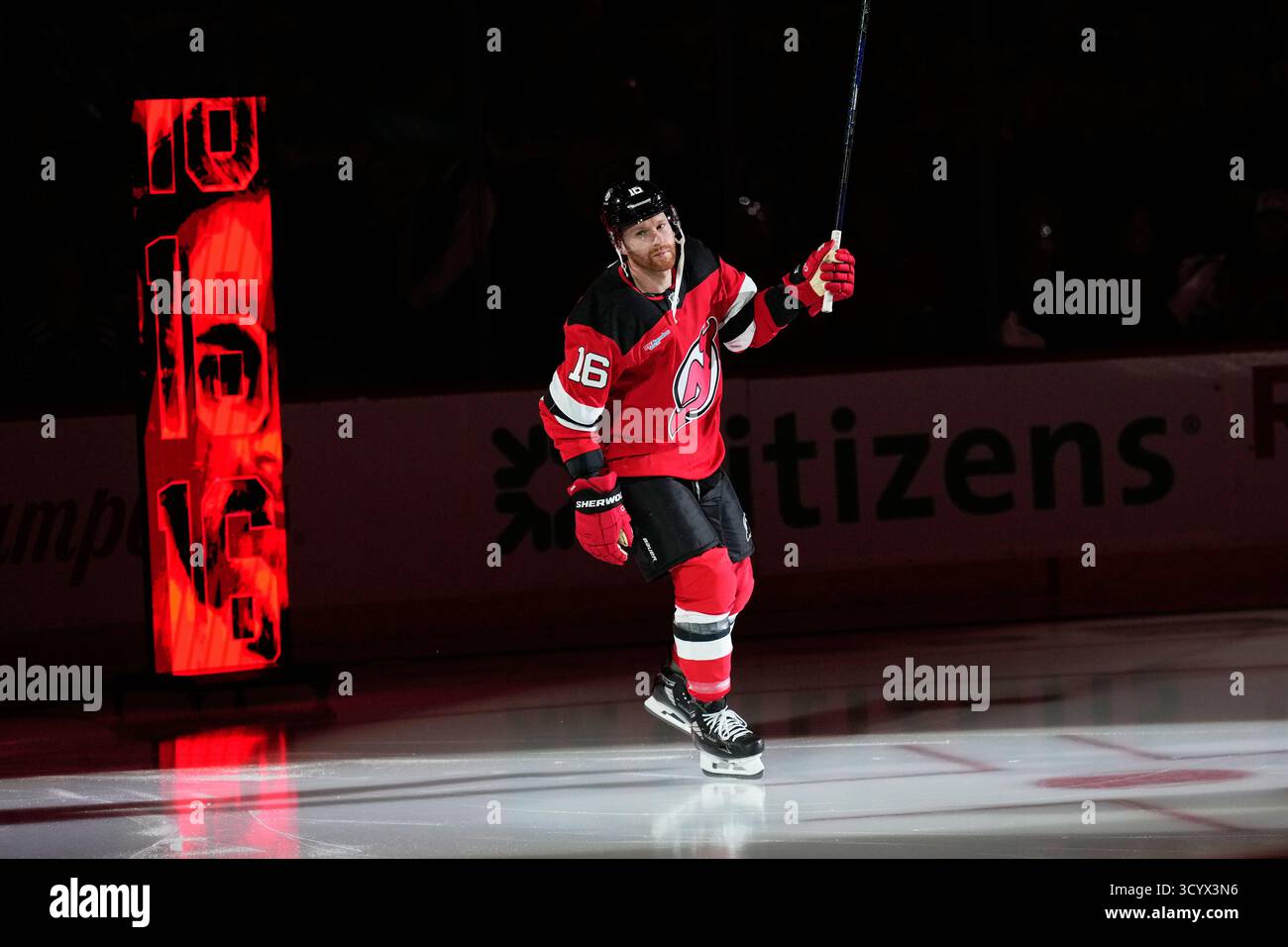 New Jersey Devils' Connor Brown is introduced before the start of an NHL hockey game against the ...