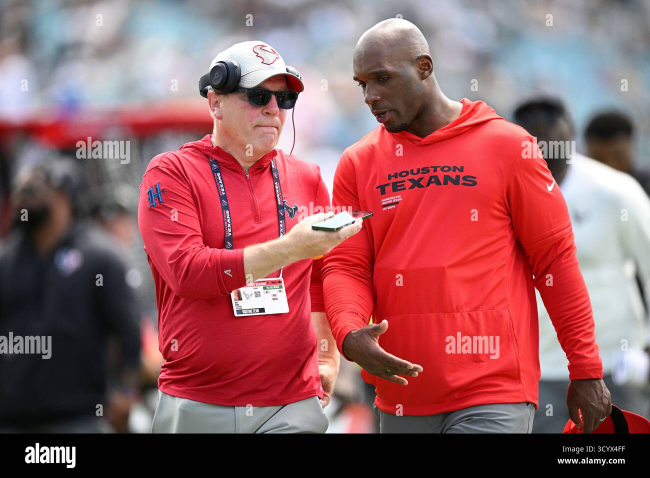 Houston Texans head coach DeMeco Ryans, right, is interviewed by John ...
