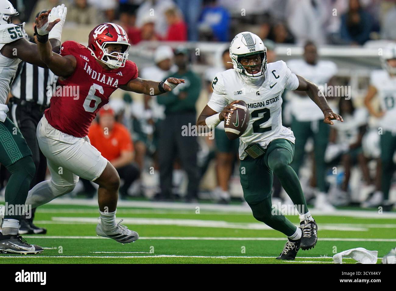 Michigan State quarterback Aidan Chiles runs with the ball during an ...