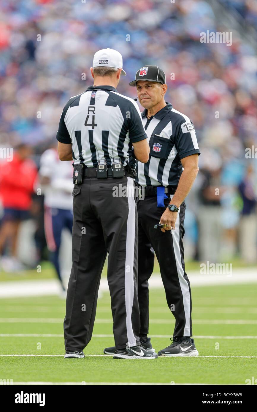 NFL referee Craig Wrolstad (4) talks with NFL side judge Frank ...