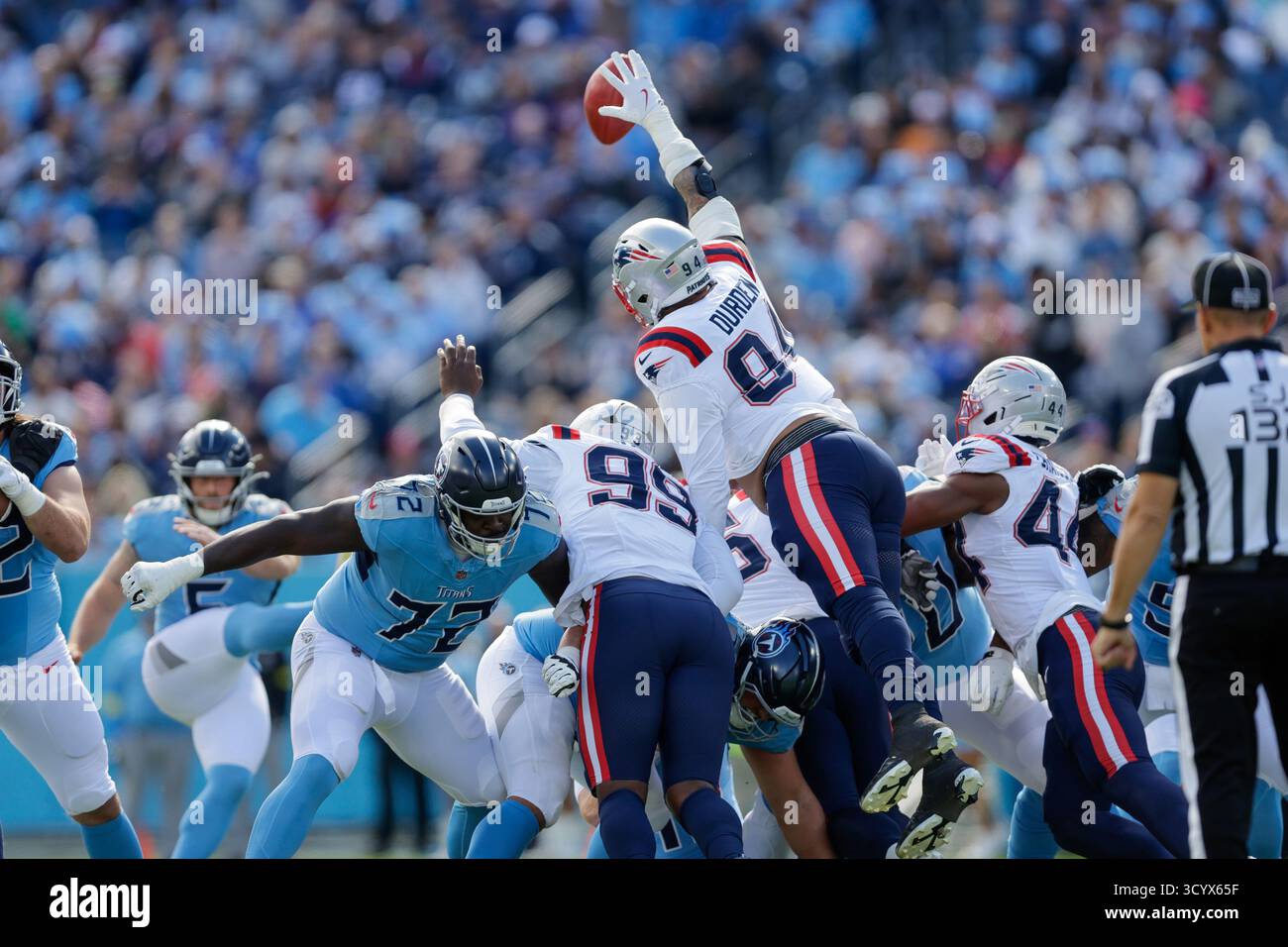 New England Patriots defensive lineman Cory Durden (94) attempts to ...