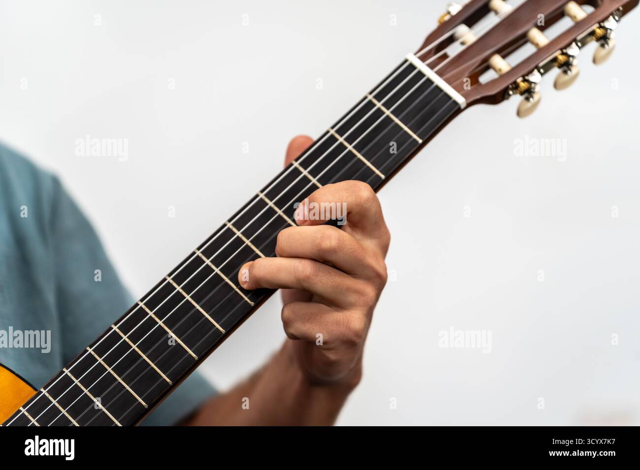 Musician hand pressing strings hi-res stock photography and images - Alamy