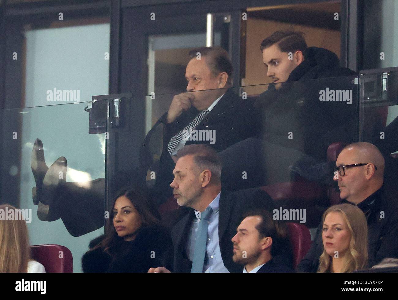 West Ham United chairman David Sullivan (top left) with son Jack ...