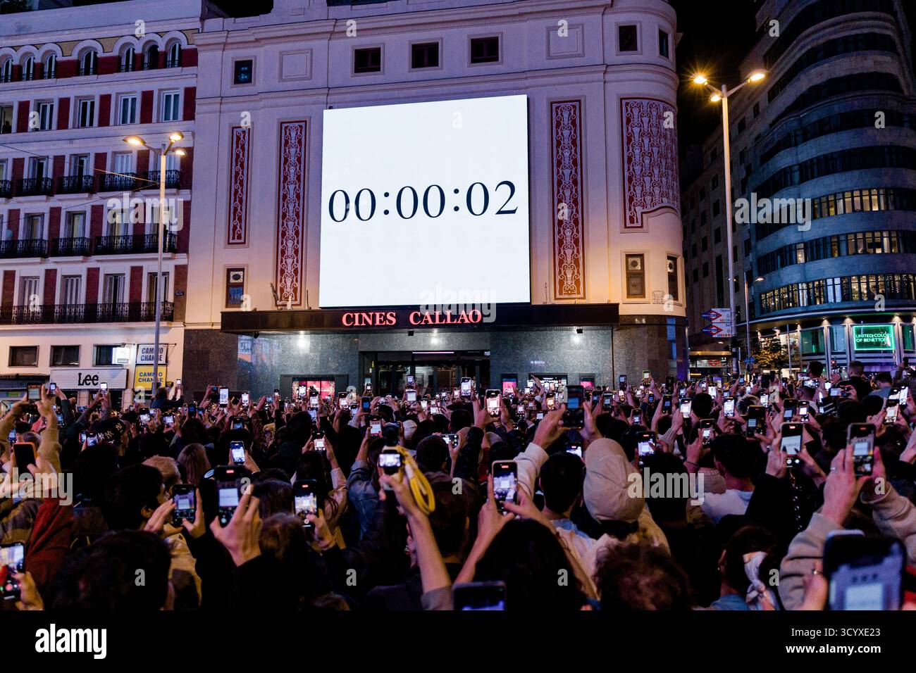 Dozens of people wait to view the cover of Rosalia's new album, 'Lux ...
