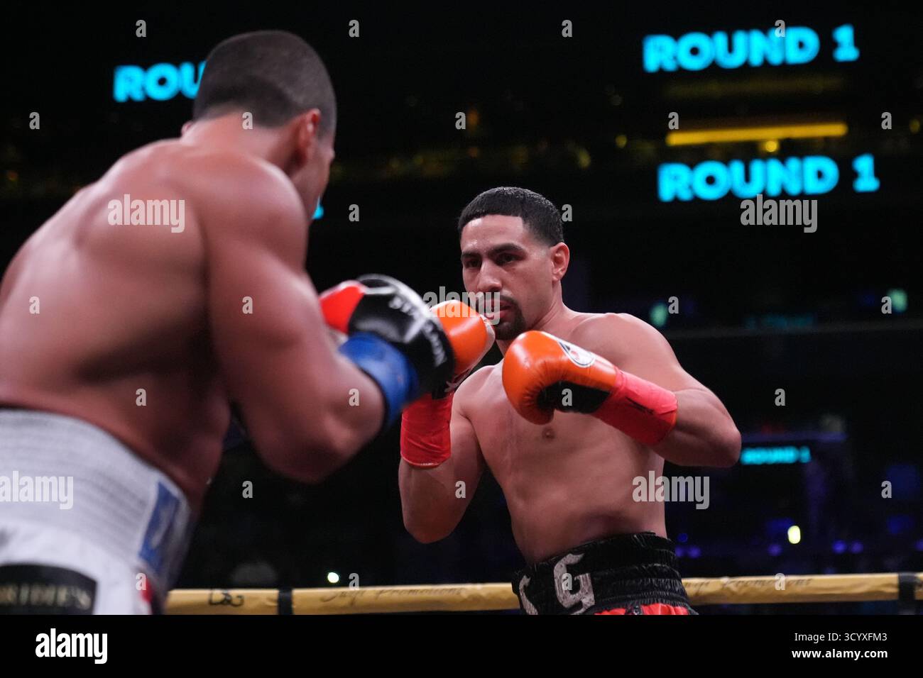 Danny Garcia, right, fights Daniel Gonzalez during the first round of a junior middleweight ...