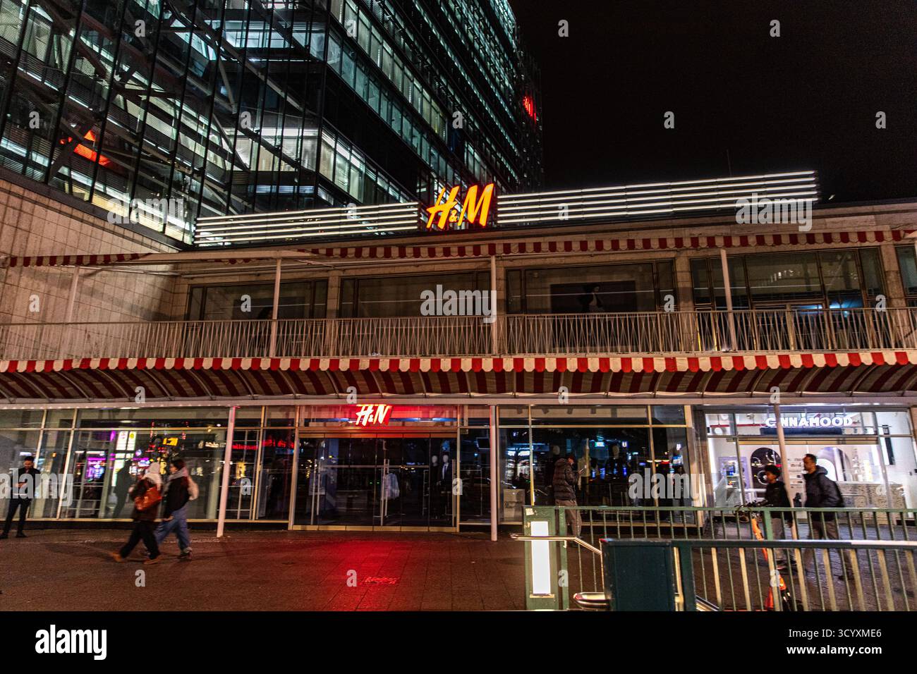 Storefronts along Berlin's Kurfuerstendamm glowed late Monday night ...