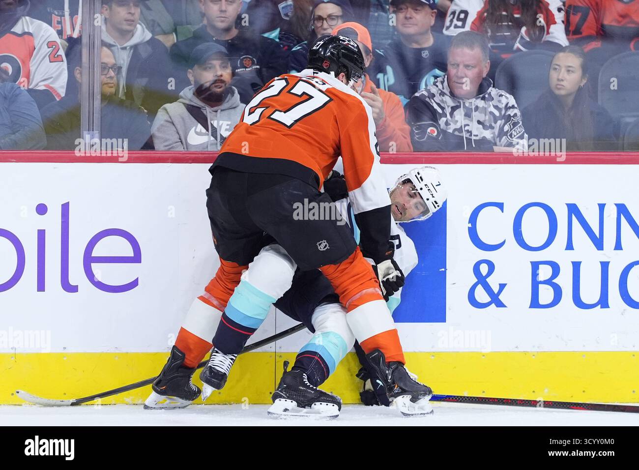 Philadelphia Flyers' Noah Cates, left, and Seattle Kraken's Jordan ...