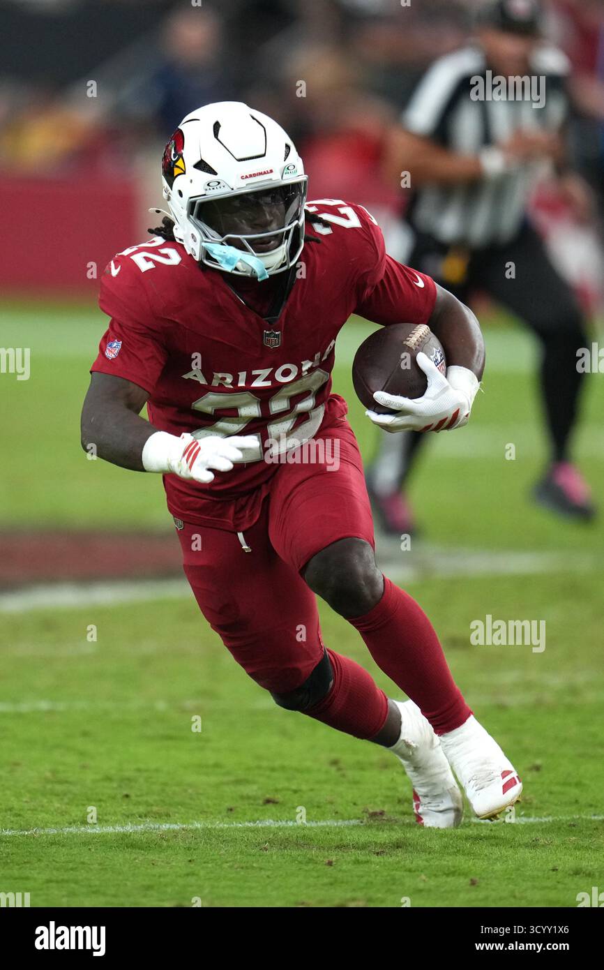 Arizona Cardinals running back Michael Carter (22) runs the ball ...