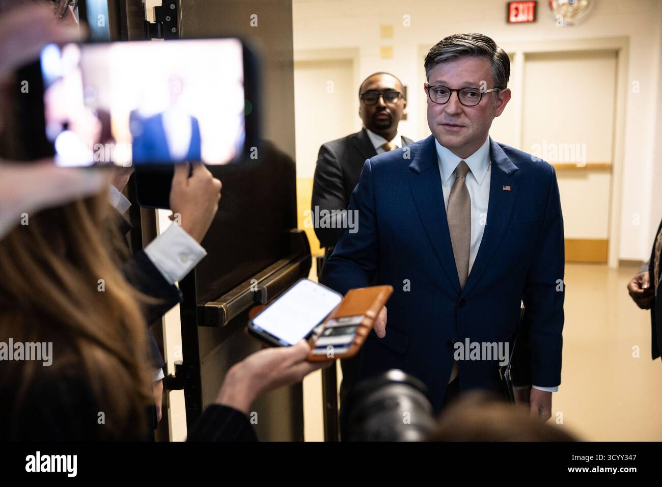 House Speaker Mike Johnson (R-La.) speaks with reporters as he departs ...