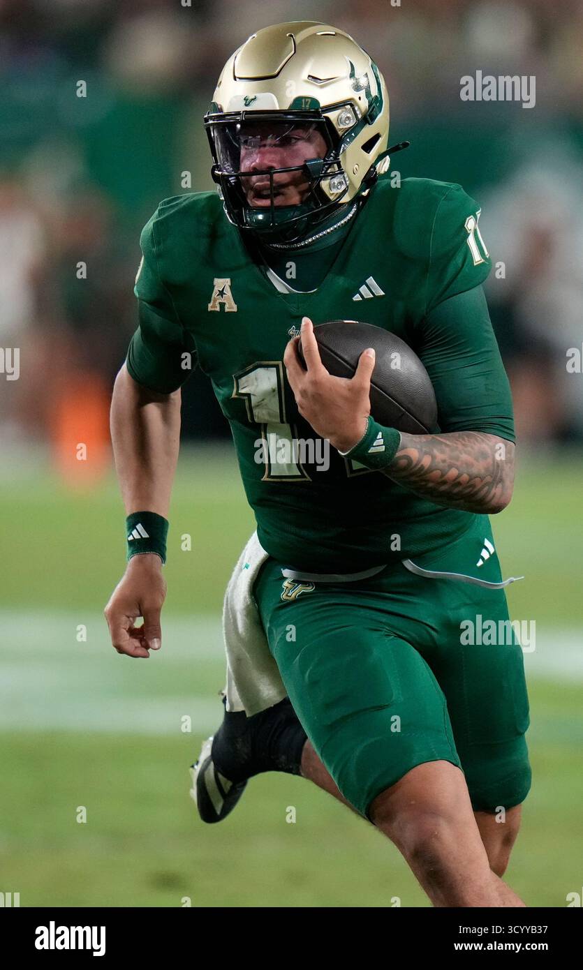 South Florida quarterback Byrum Brown runs against Florida Atlantic ...