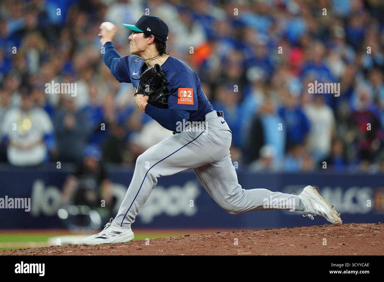 Seattle Mariners pitcher Bryan Woo delivers against the Toronto Blue ...