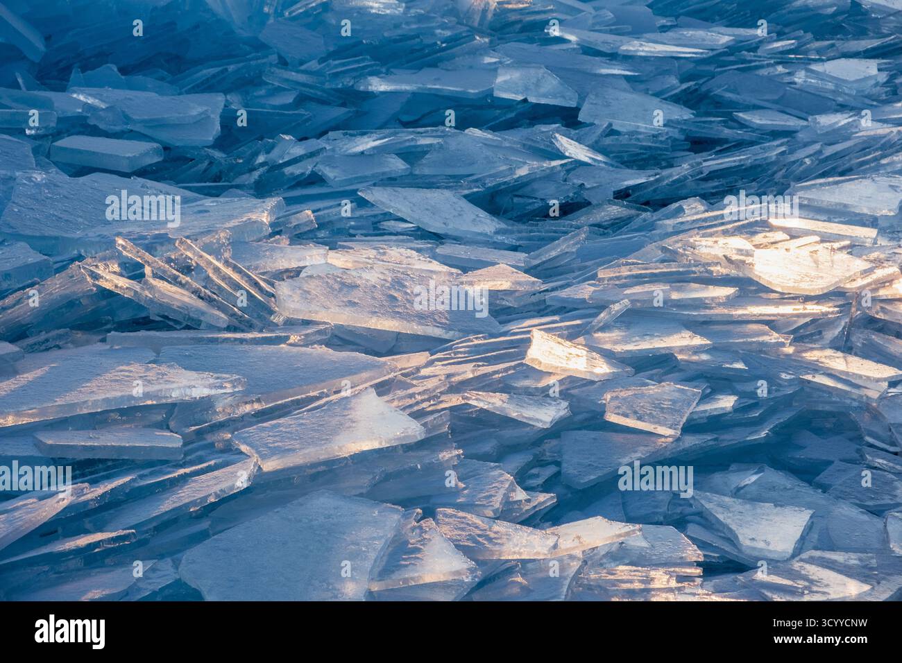 Endless hummock field on frozen Lake Baikal. Piles of snow-covered ...